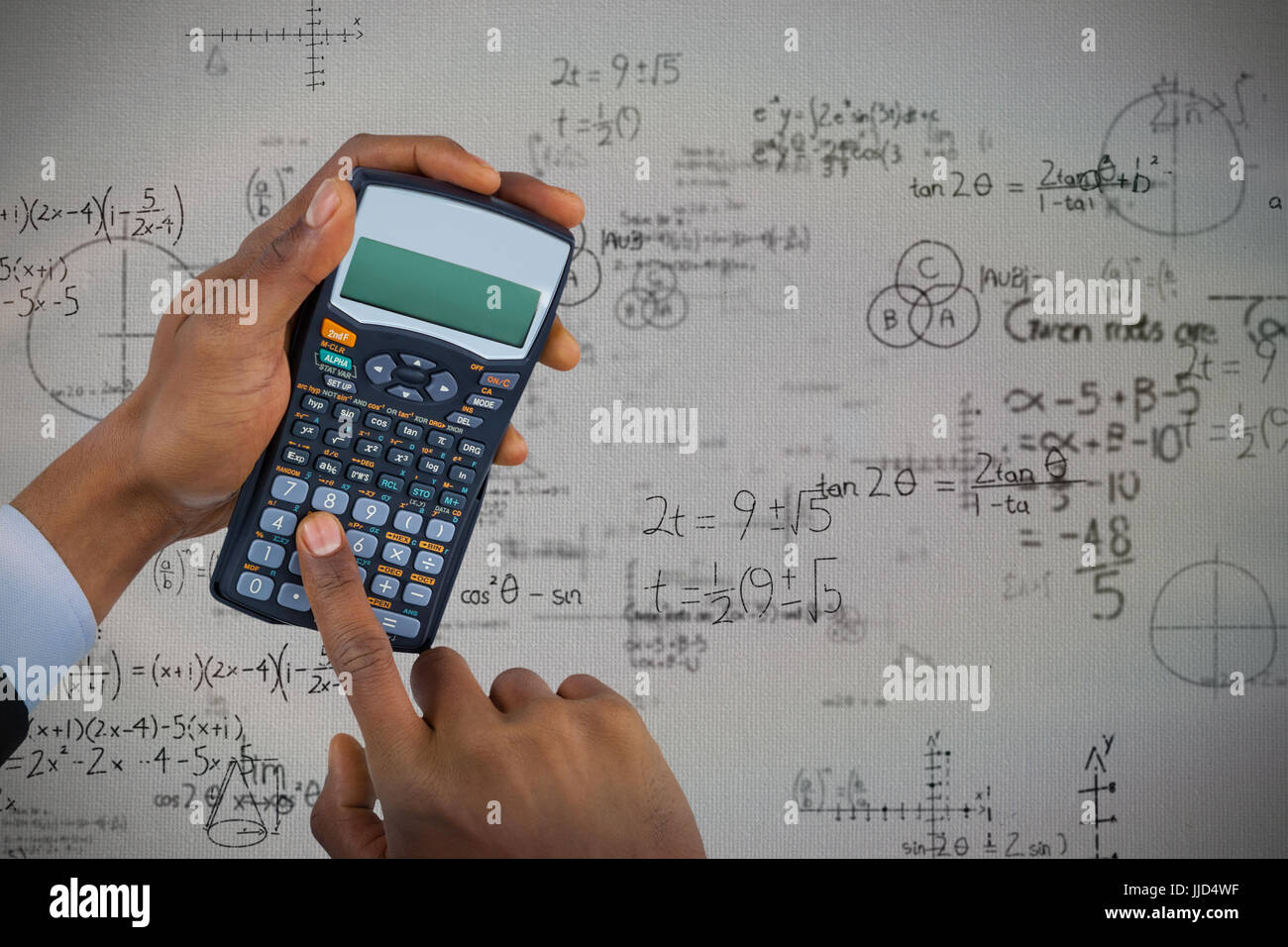 Hands of businessman using calculator against mathematical problems ...