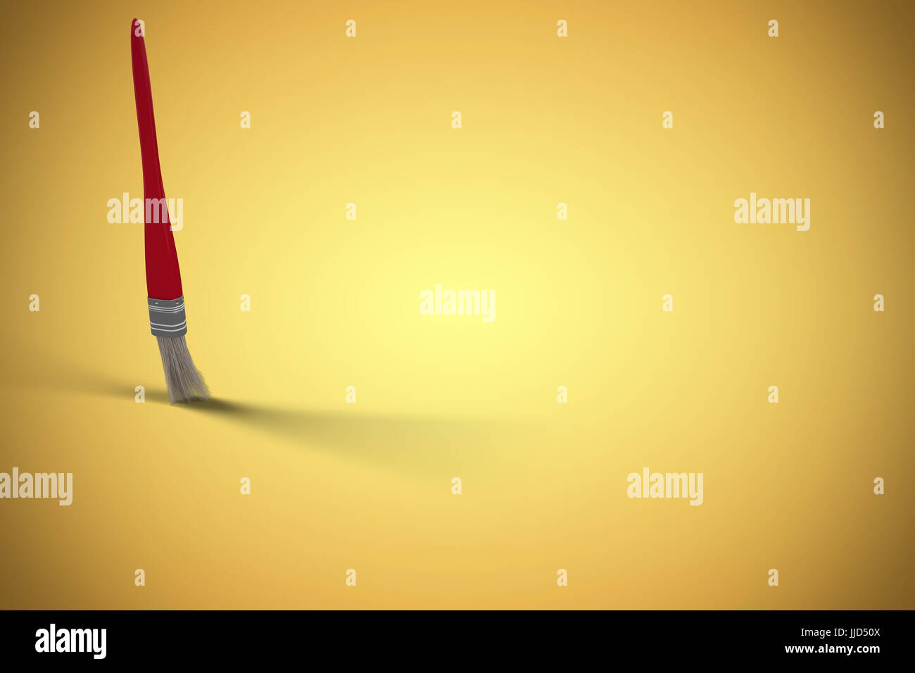 Illustration of paintbrush against yellow vignette Stock Photo - Alamy