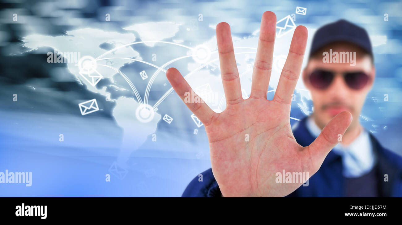 Confident security officer making stop gesture against virus background ...