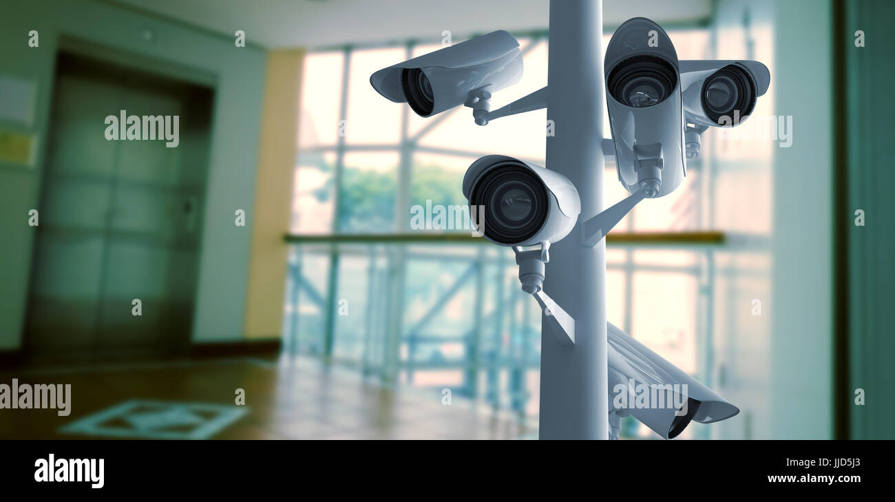 CCTV camera against foyer area with elevator Stock Photo - Alamy