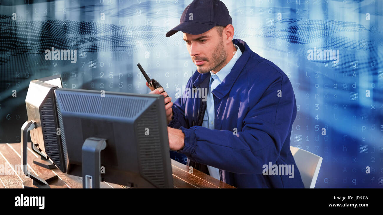 Security man looking at monitors hi-res stock photography and images ...