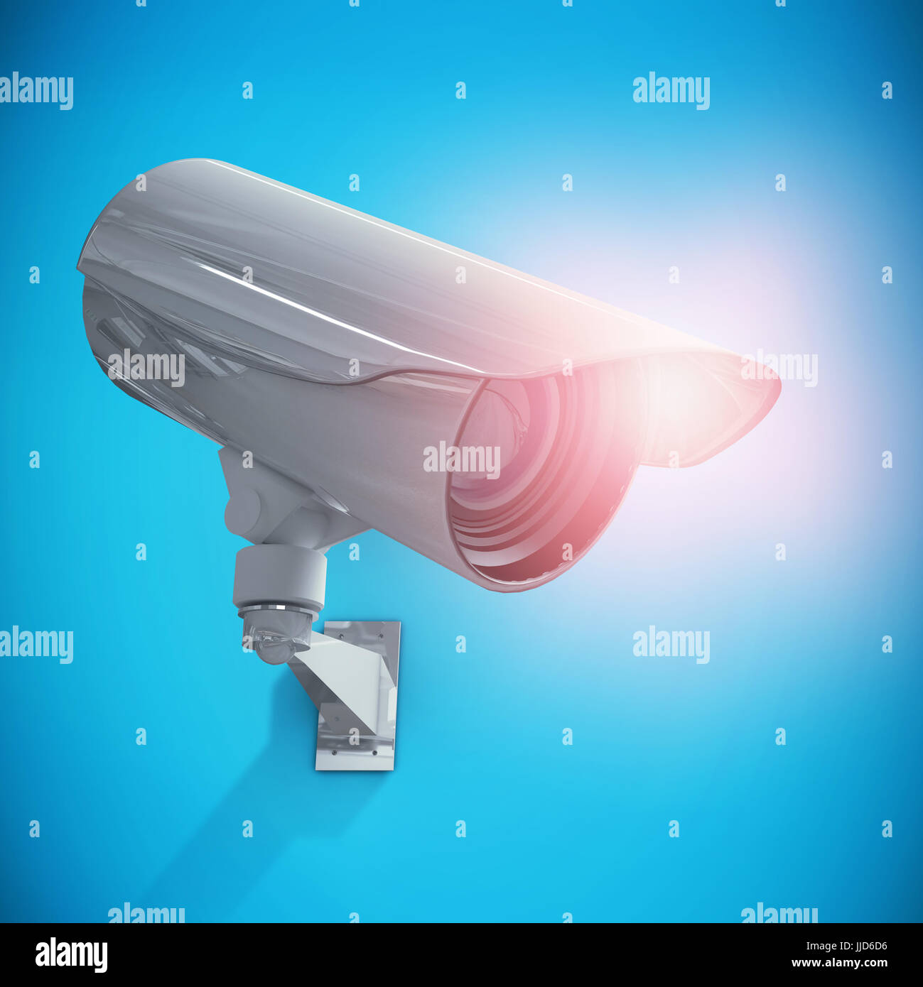 CCTV camera against blue background Stock Photo - Alamy