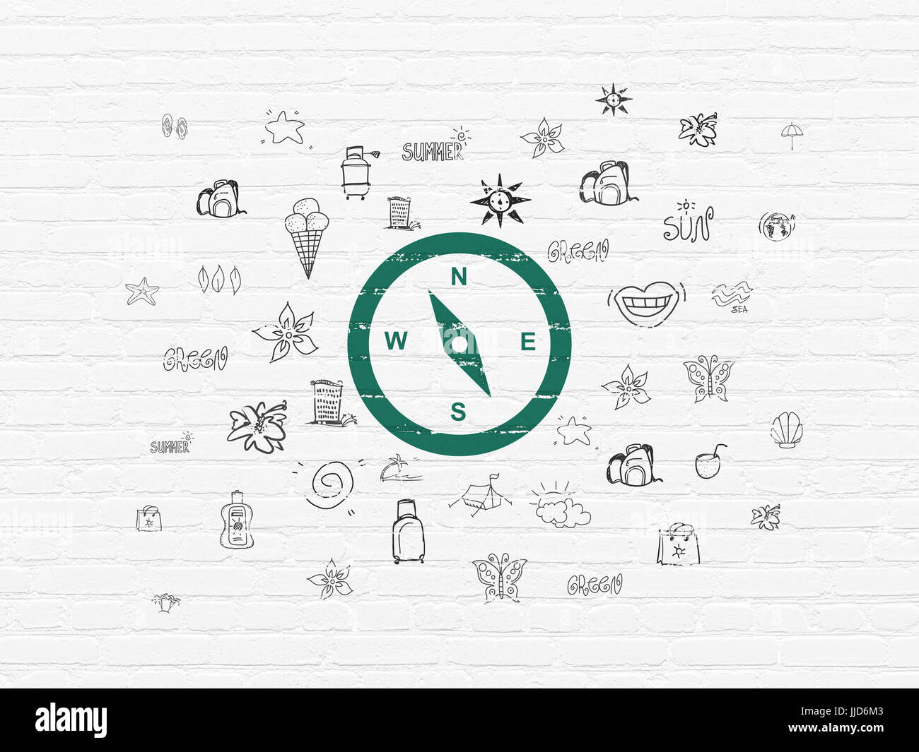 Tourism concept: Compass on wall background Stock Photo - Alamy