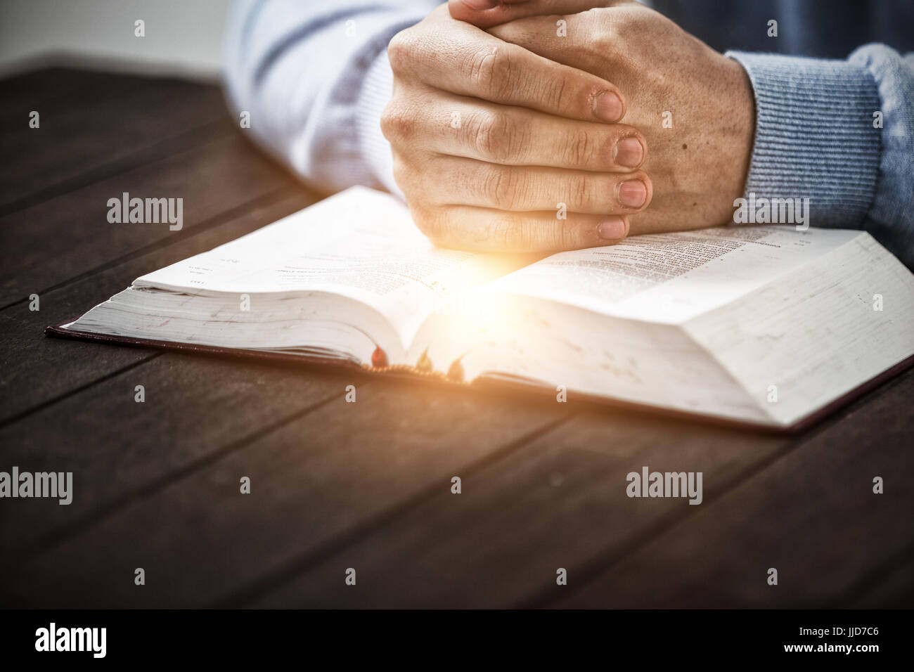 Praying at desk hi-res stock photography and images - Alamy