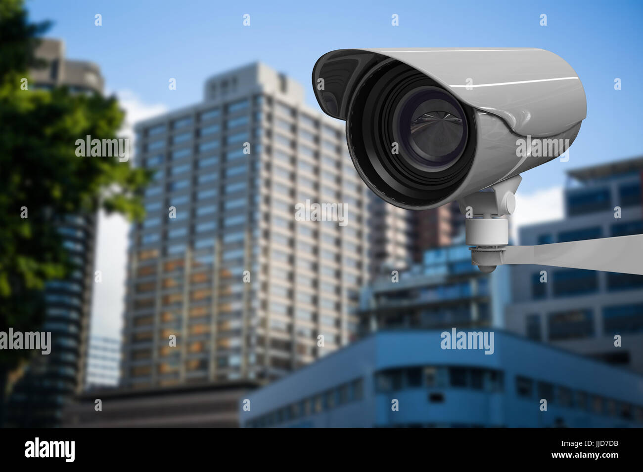 CCTV camera against beautiful cityscape against clear sky Stock Photo ...