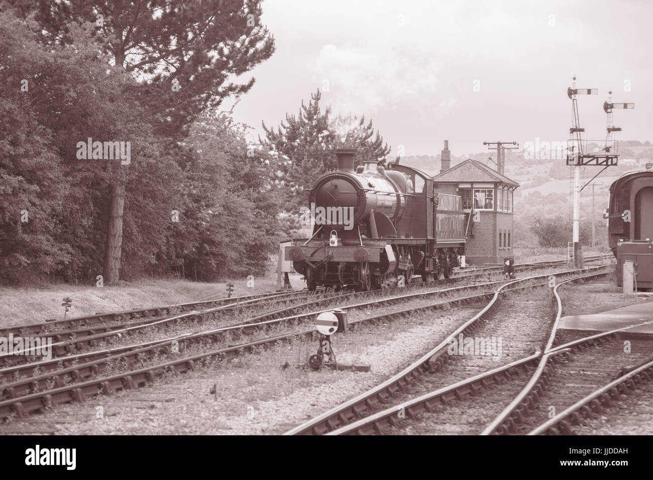 Steam Train on Railway Track in Black and White Sepia Tone Stock Photo ...