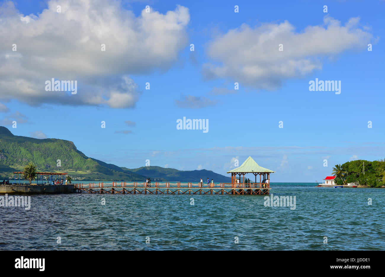 Seascape with a wooden bridge in Mahebourg, Mauritius. Mauritius, an ...
