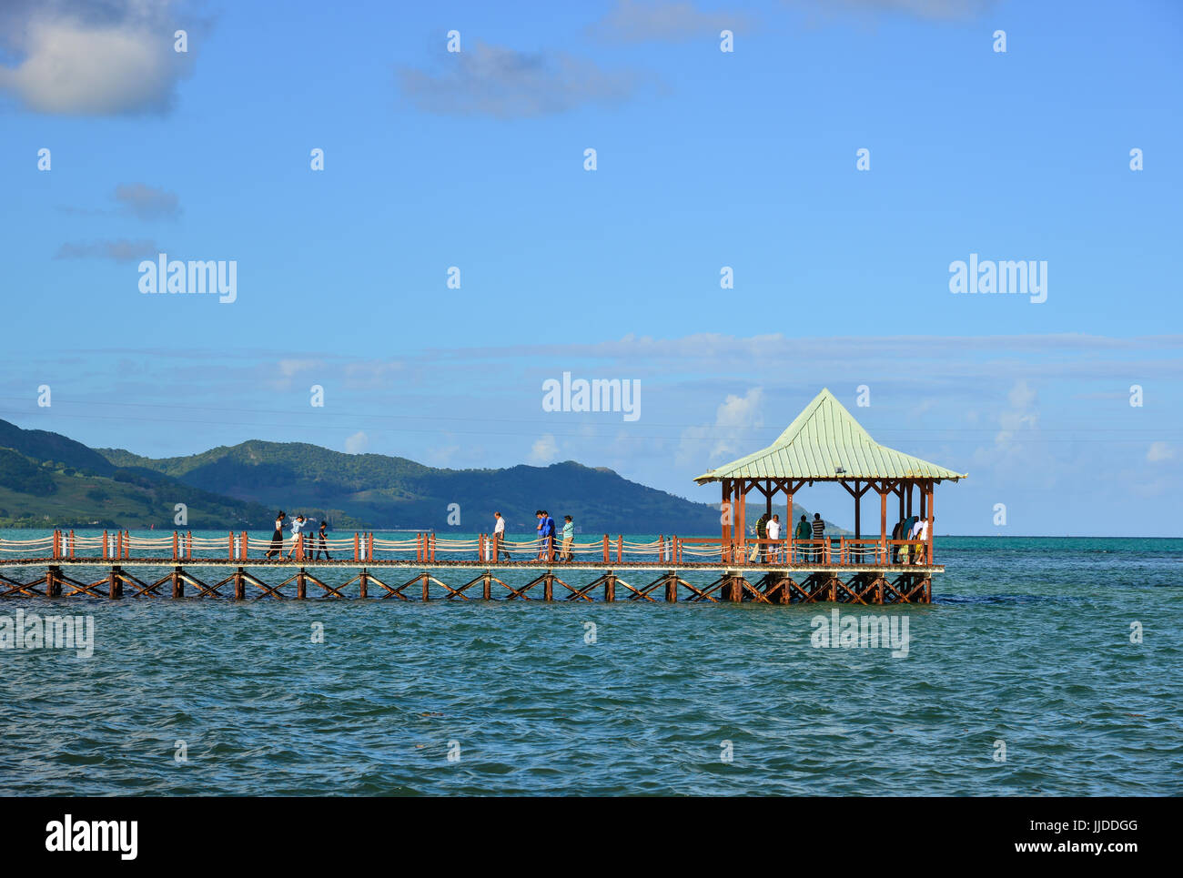 Mahebourg, Mauritius - Jan 3, 2017. People on wooden bridge in ...