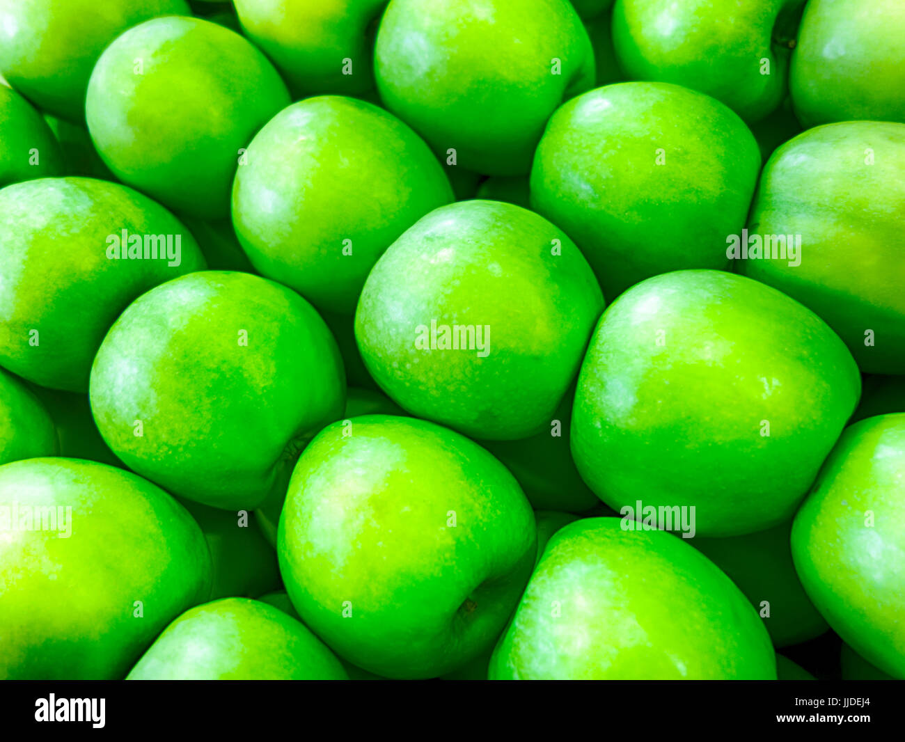 Green apples background. Full frame Stock Photo - Alamy