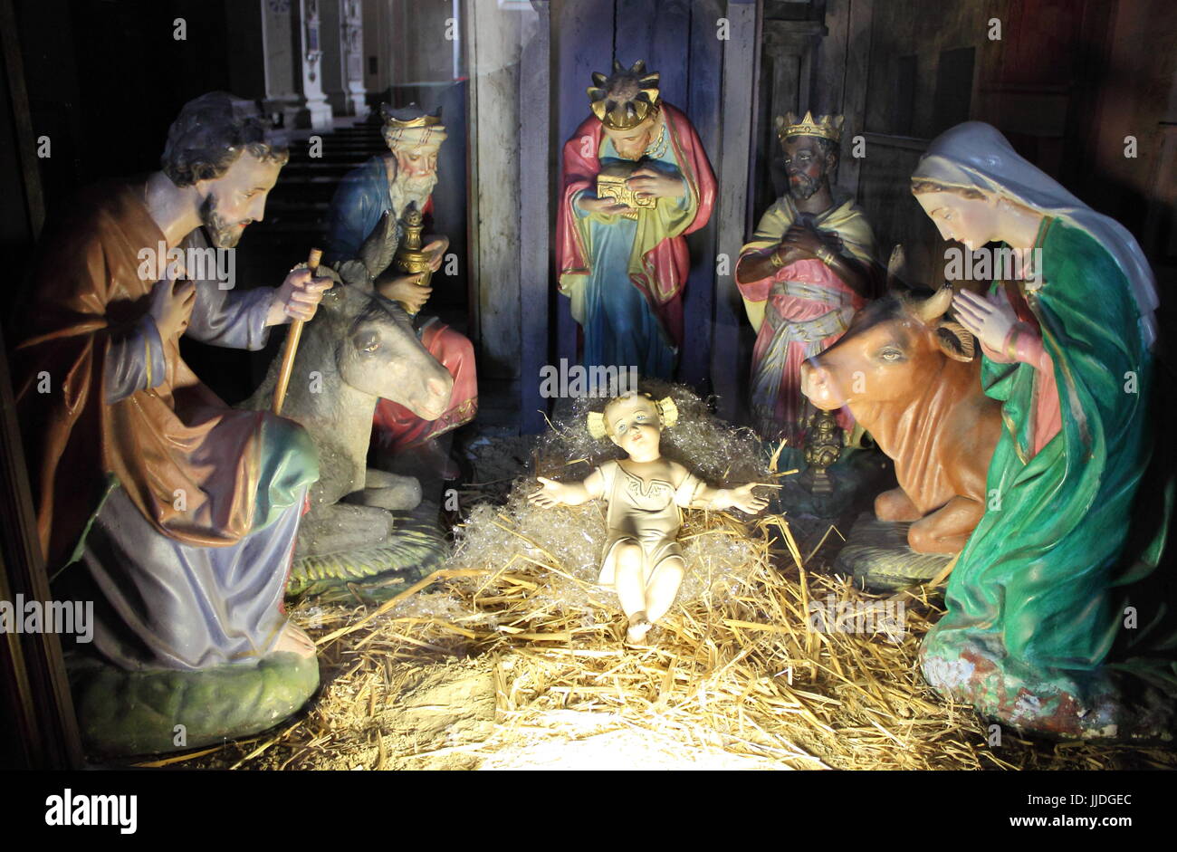 Christmas nativity scene with hand colored ceramic figures Stock Photo ...