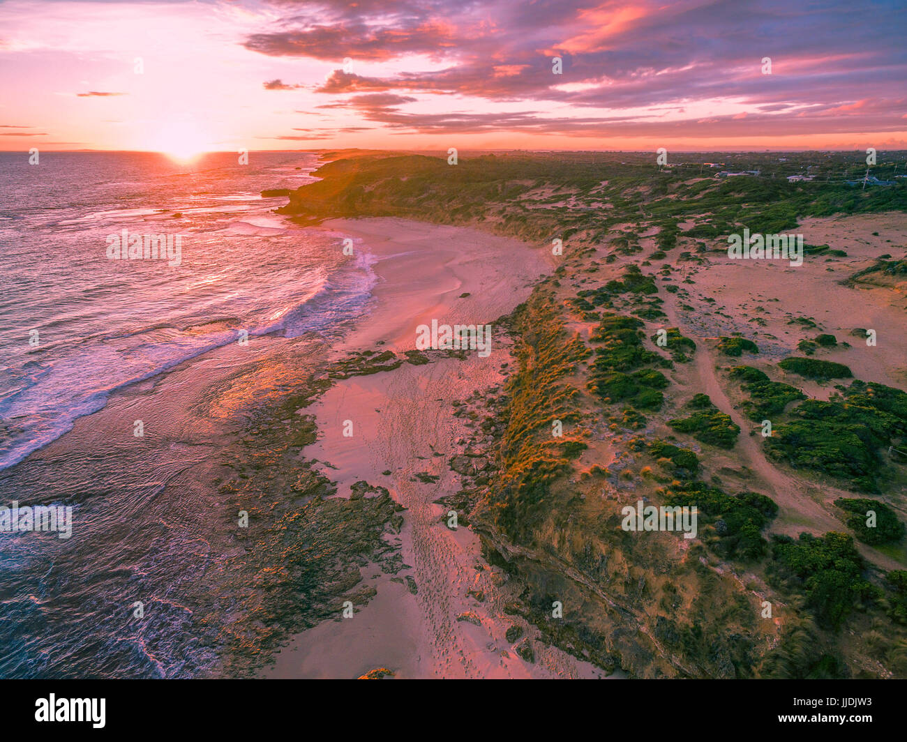 Aerial view of beautiful sunset over sandy beach on Mornington ...