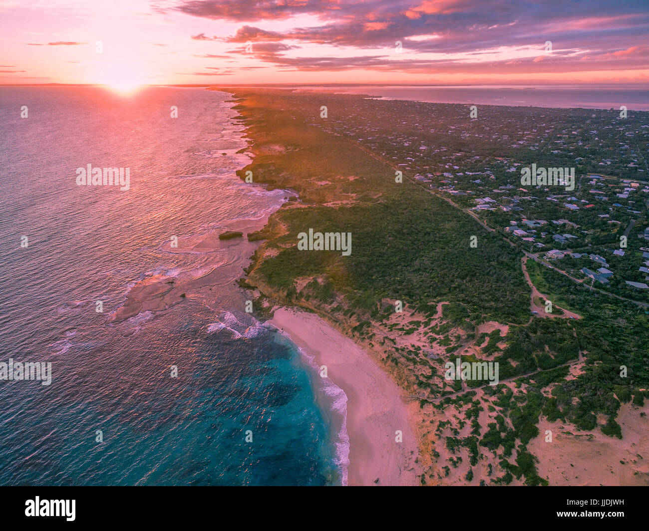 Aerial view of Rye suburb and ocean coastline at beautiful sunset ...