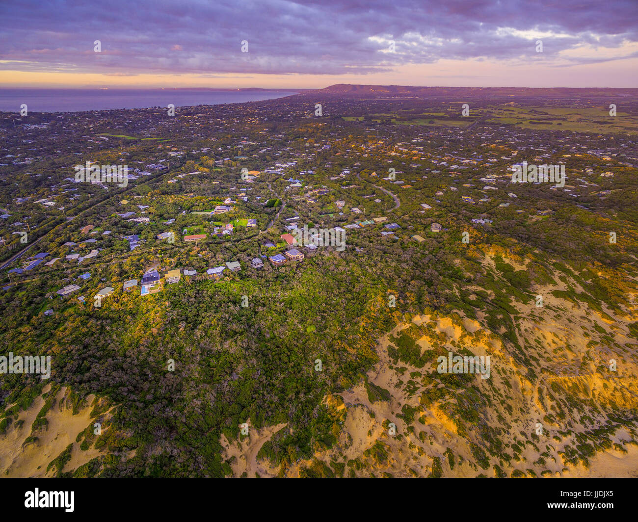Aerial view of Mornington Peninsula suburban areas near Rye at sunset ...