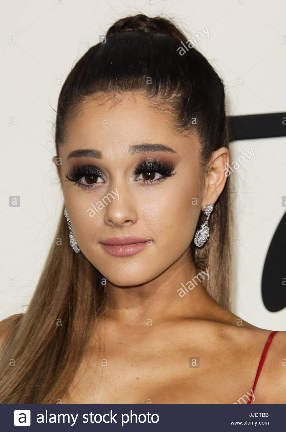 Ariana Grande. Singer Ariana Grande arrives at The 58th Grammy Awards ...