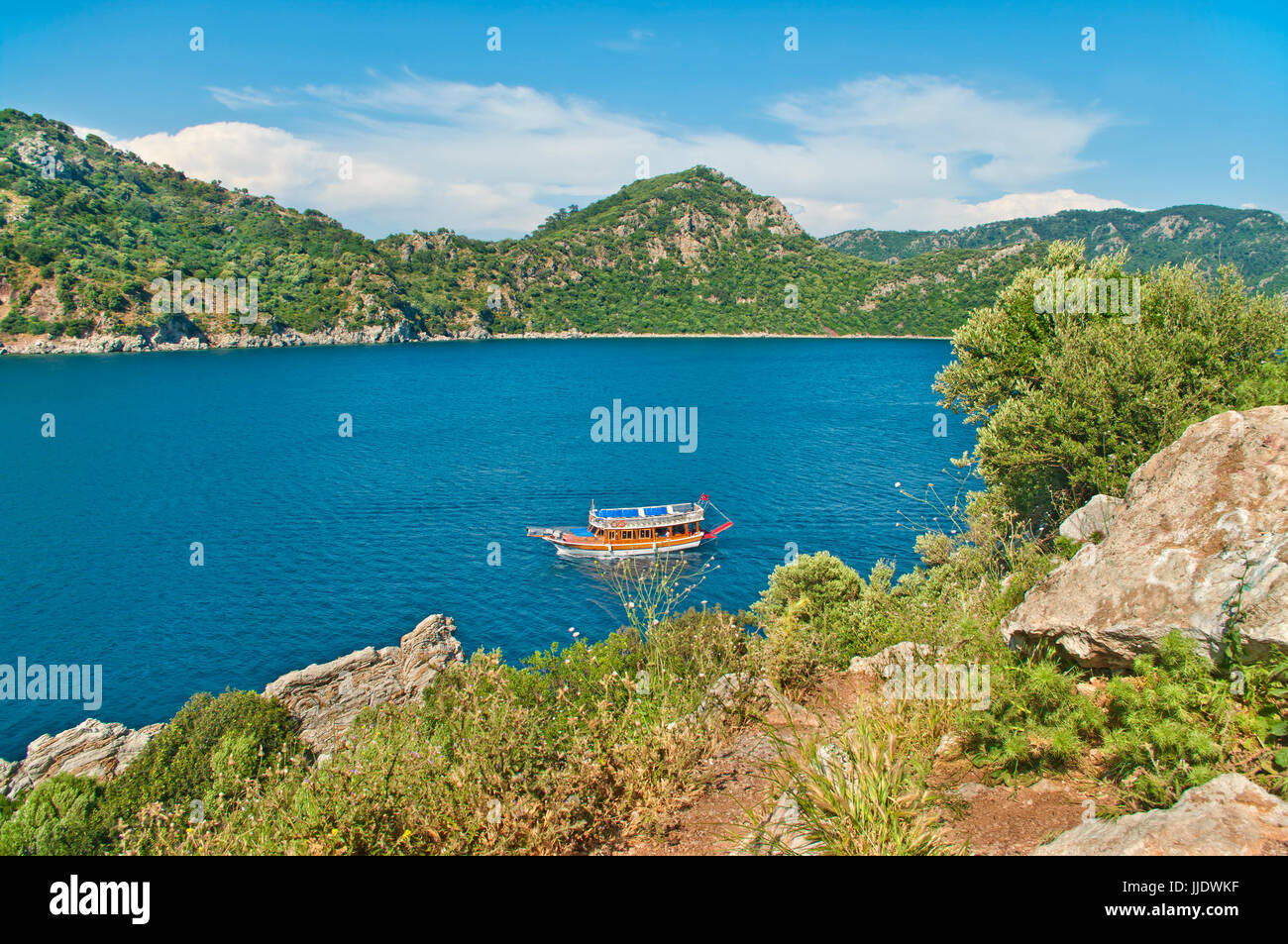 Sea view with tourist boat hi-res stock photography and images - Alamy
