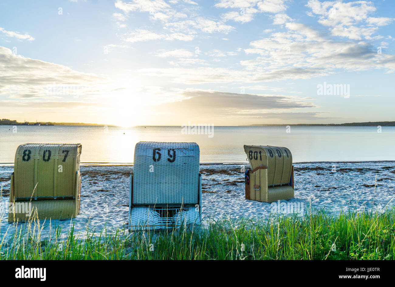 European Beach wicker chairs are placed decoratively on the beach for ...