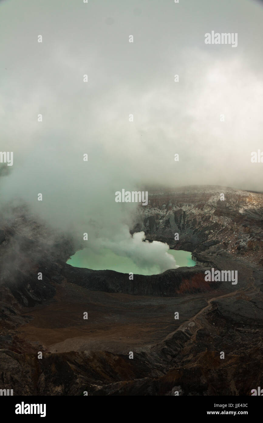 Poas volcano with green smoke Stock Photo - Alamy