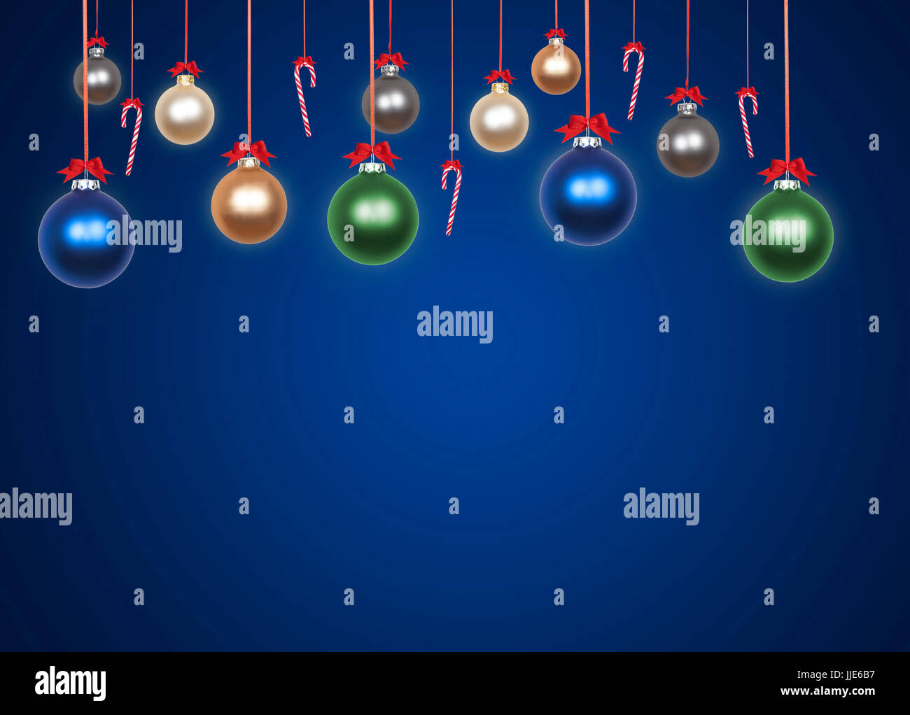 Baubles on blue background Stock Photo - Alamy