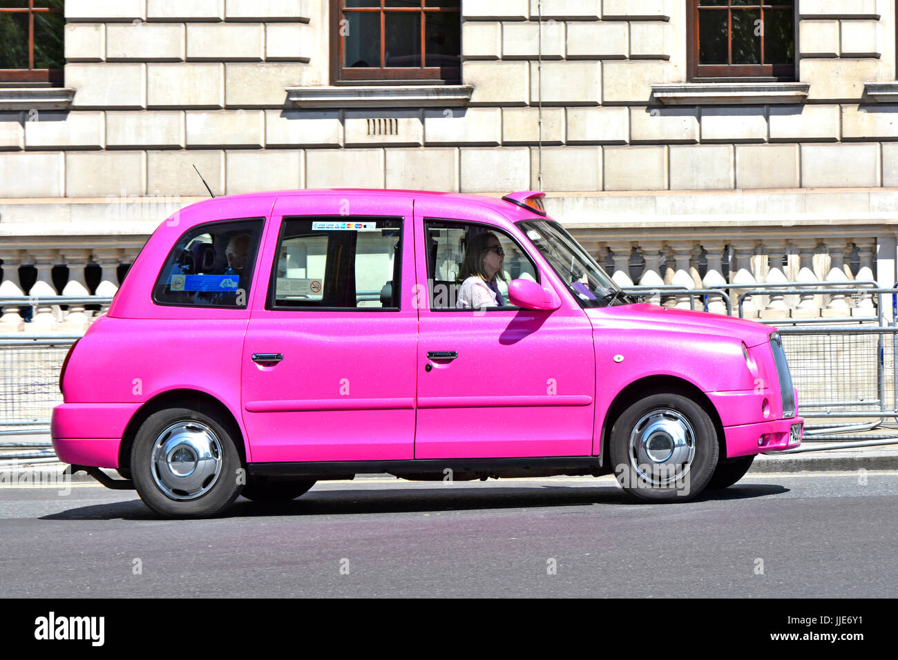 Pink taxi in london hi-res stock photography and images - Alamy