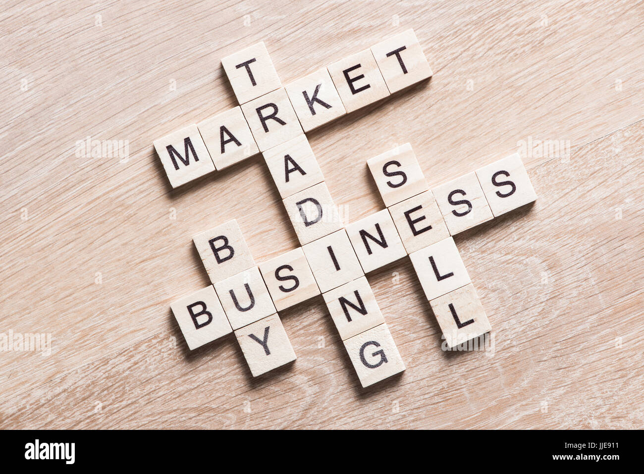 Conceptual business keywords on table with elements of game making ...