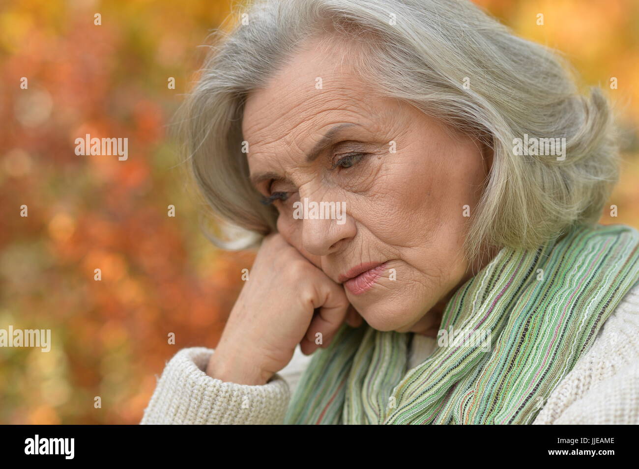 sad senior woman Stock Photo - Alamy