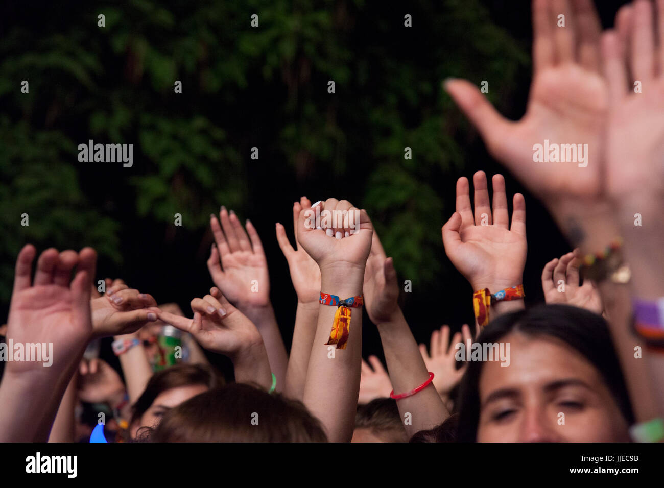 People raising hands hi-res stock photography and images - Alamy