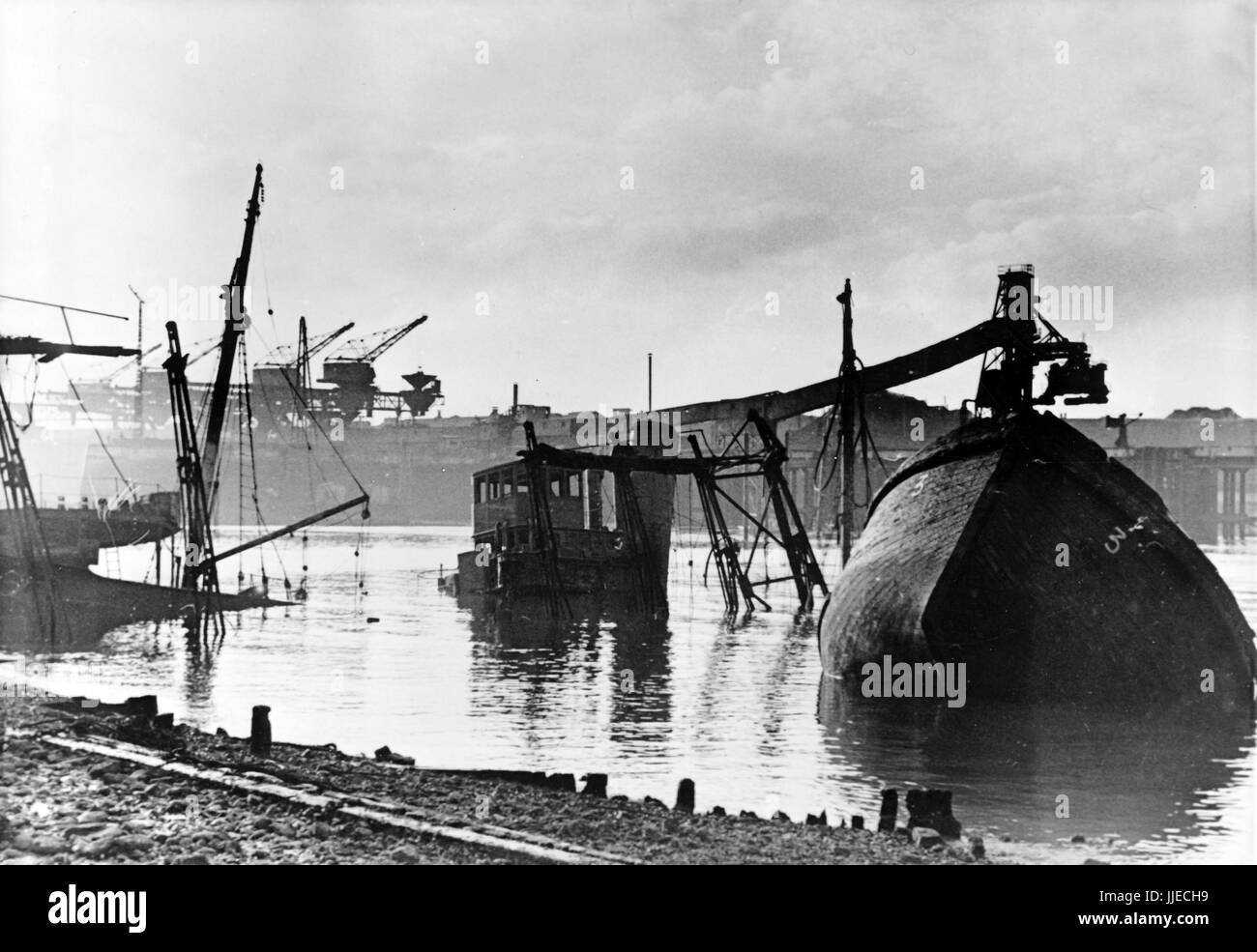 The Nazi propaganda image shows destroyed ships in a harbour in French ...