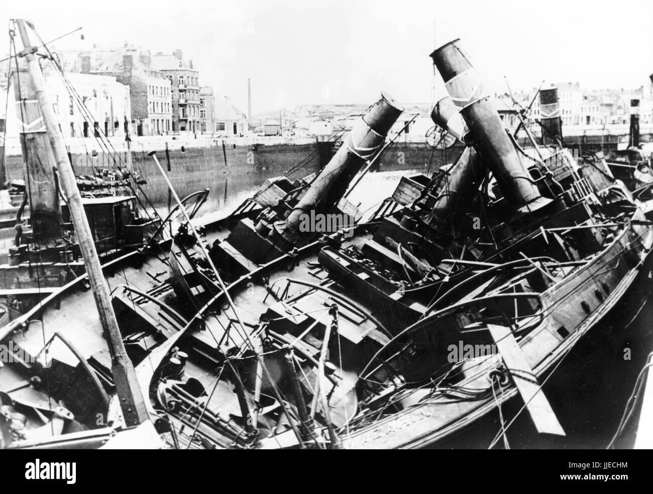 The Nazi propaganda image shows destroyed ships in the harbour of the ...