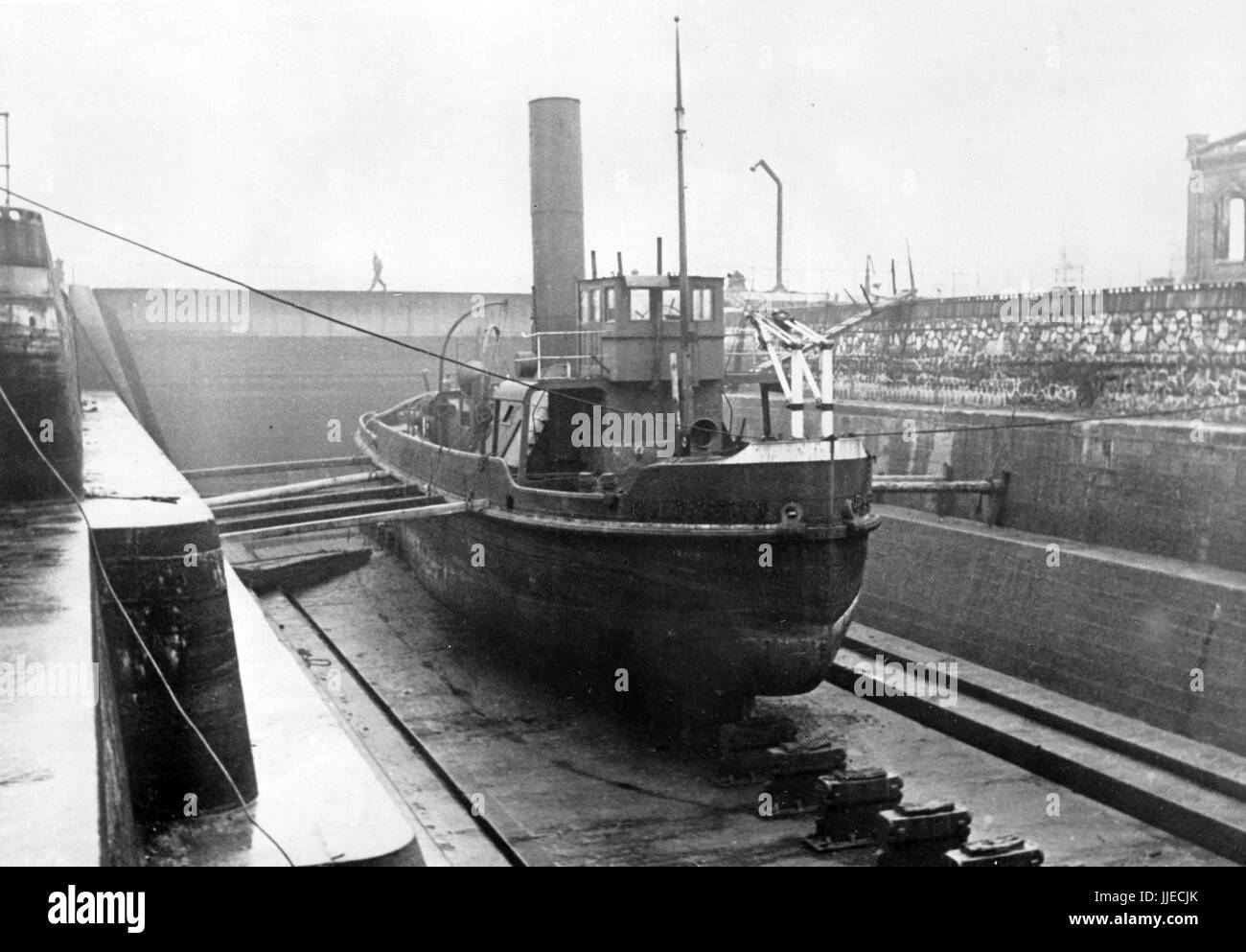 The Nazi propaganda image shows a repaired Belgian ship in a dry dock ...