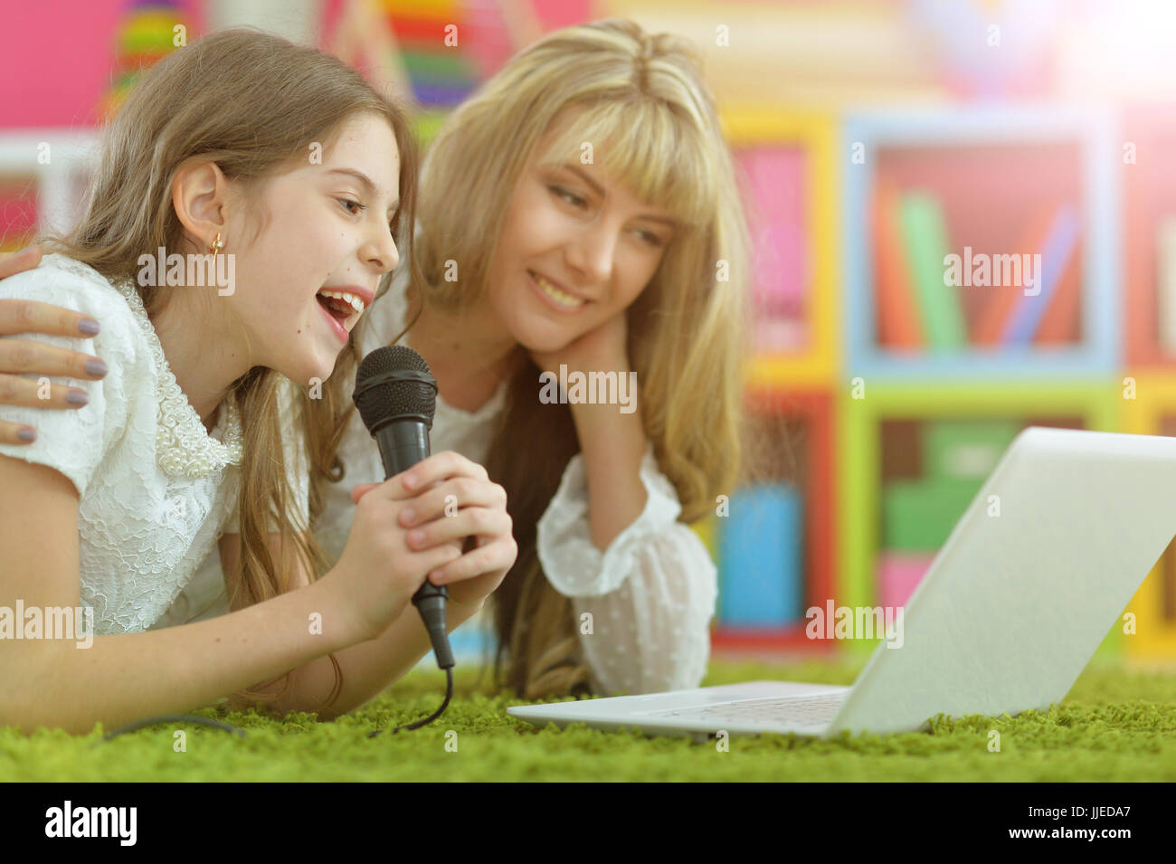 girl singing karaoke Stock Photo - Alamy
