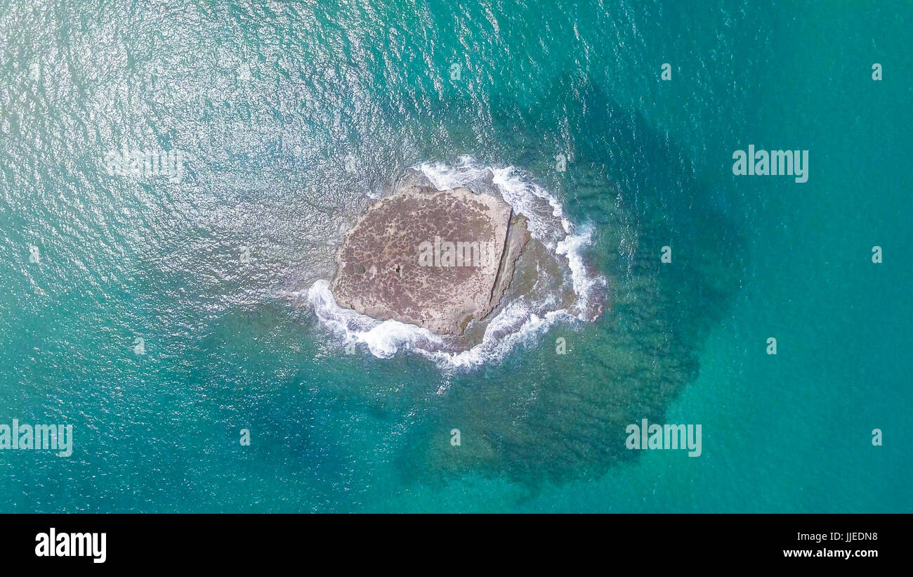 Top down aerial view of a small island Stock Photo - Alamy