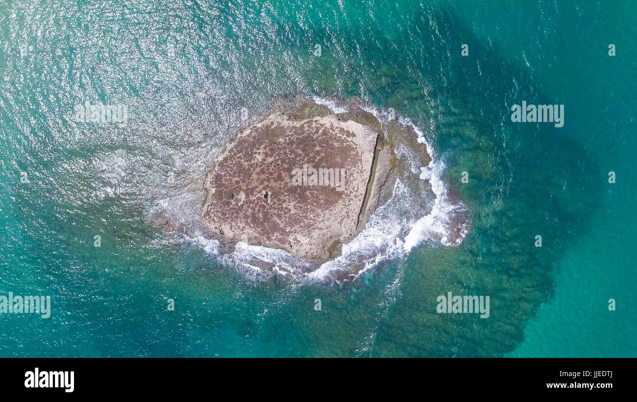Top down aerial view of a small island Stock Photo - Alamy