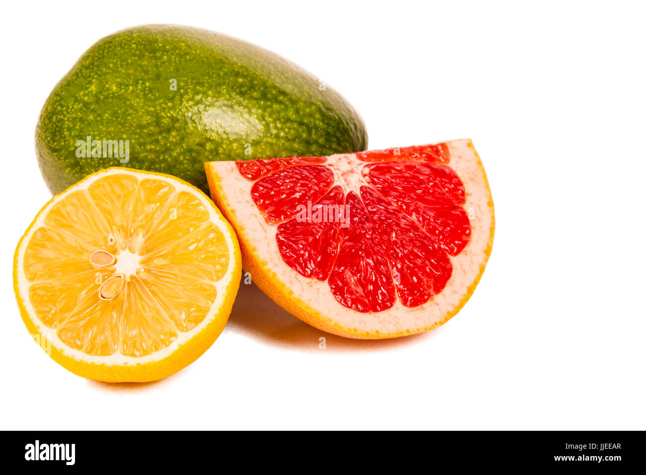 Bright variety of fruits, juicy citrus and avocado Stock Photo - Alamy