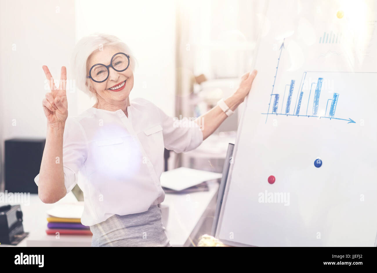Positive talented business lady having fun in the office Stock Photo ...
