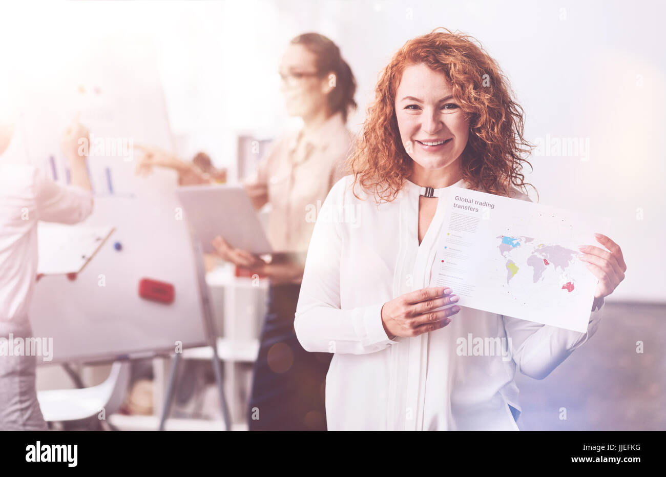 Talented ambitious women presenting a project Stock Photo - Alamy