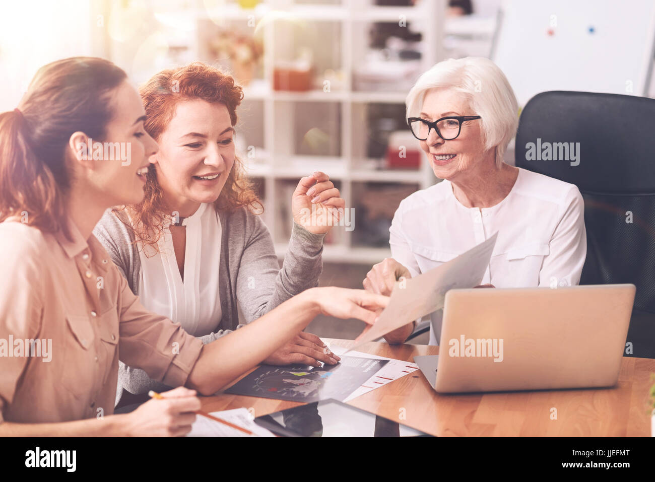 Curious professional business lady asking for more details Stock Photo ...