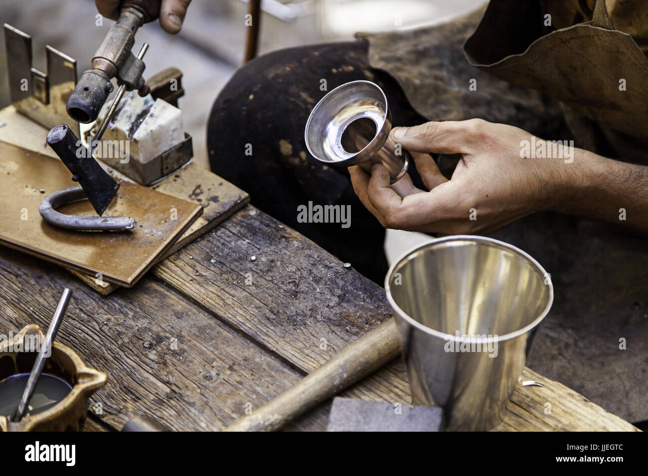Working with iron and a welder, detail of old craft craftsman Stock ...