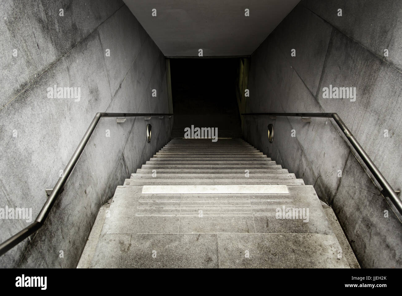 Stairs of an access to an underground tunnel, detail of stairs for ...