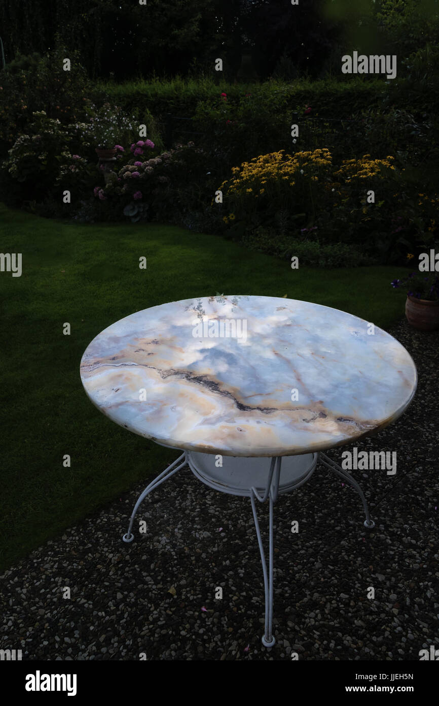 Berlin, Germany, on a wet table top reflects the sky Stock Photo - Alamy