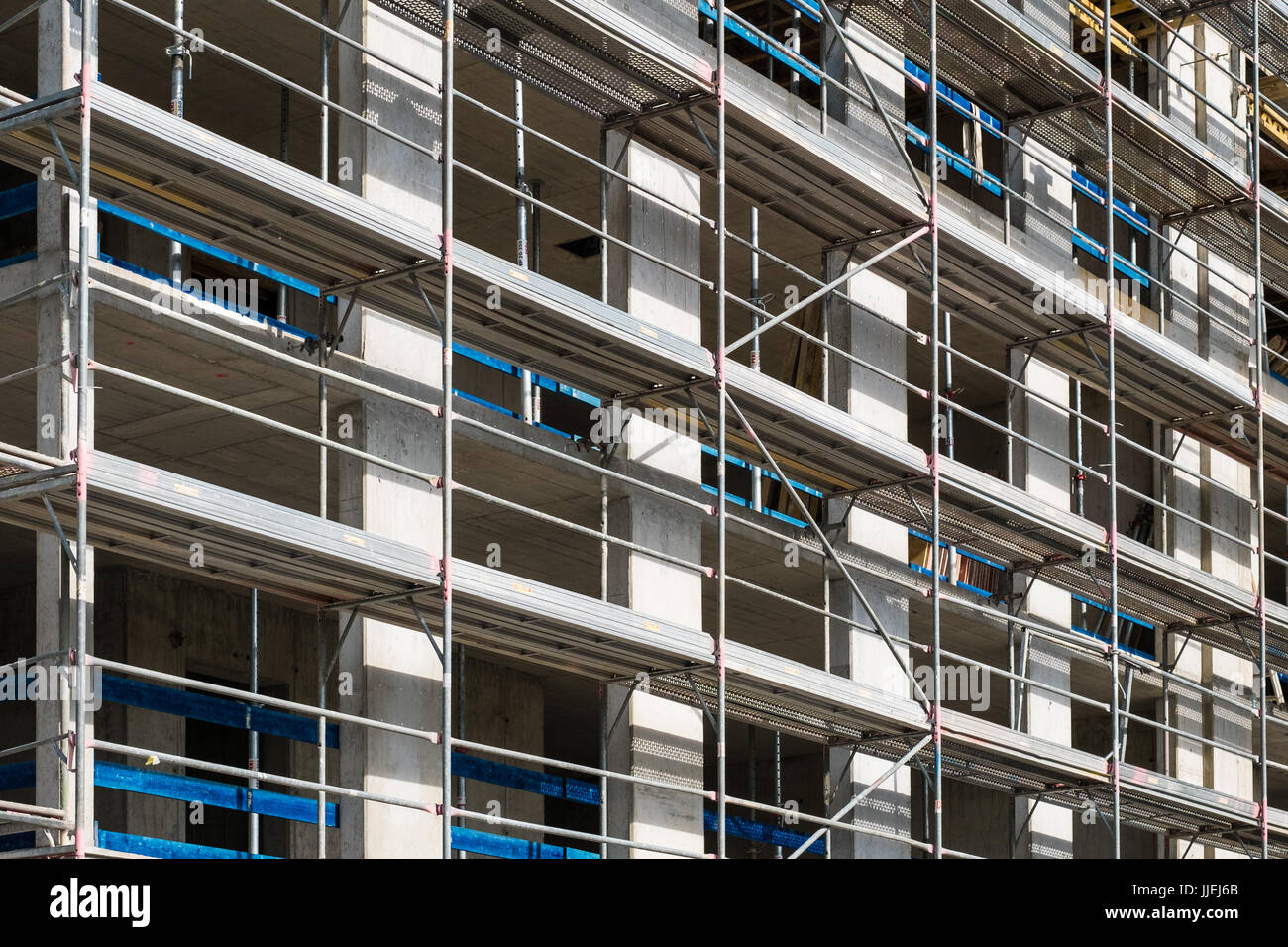 construction site, scaffolding on building facade Stock Photo - Alamy