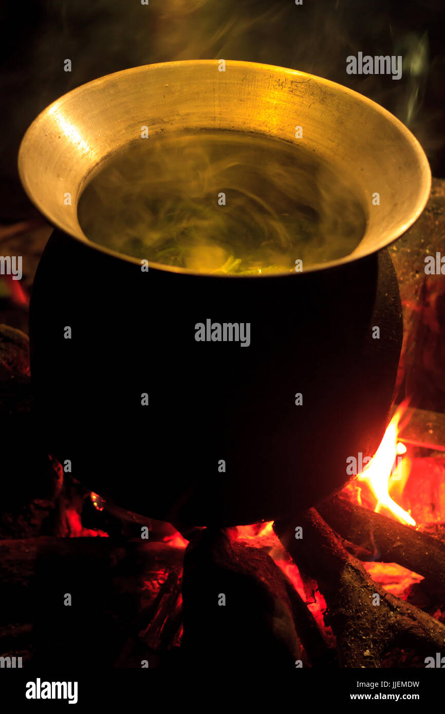 Big Pot on the camp fire in the evening. Spring mountains Stock Photo ...