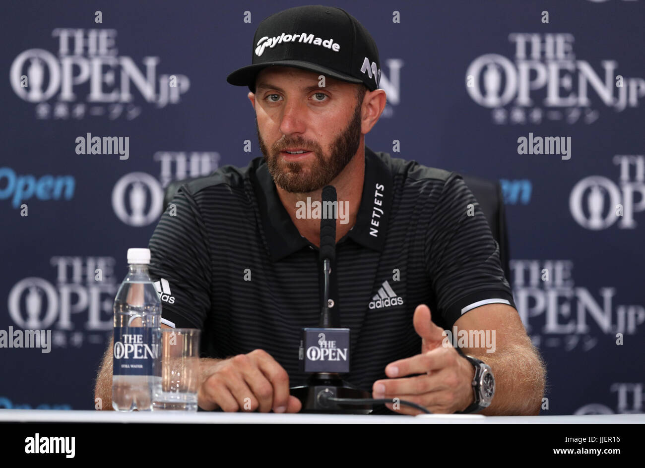 USA's Dustin Johnson speaks at a press conference during practice day ...