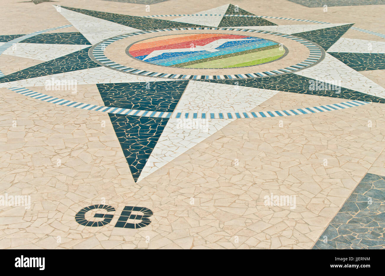 inlayed compass with turkish letters and bird in center at square in ...