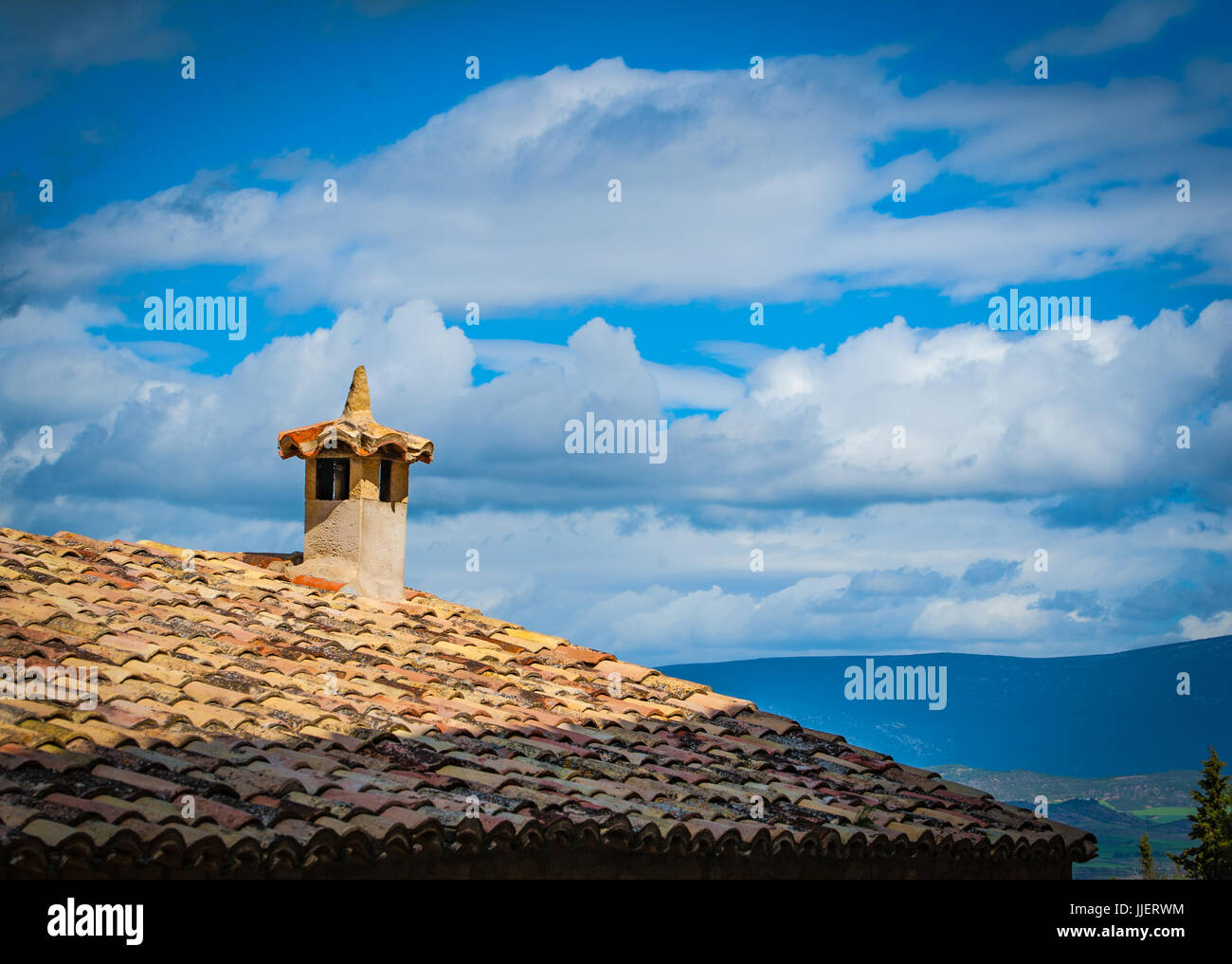 Specific shape of chimneys of a Spanish village Stock Photo - Alamy