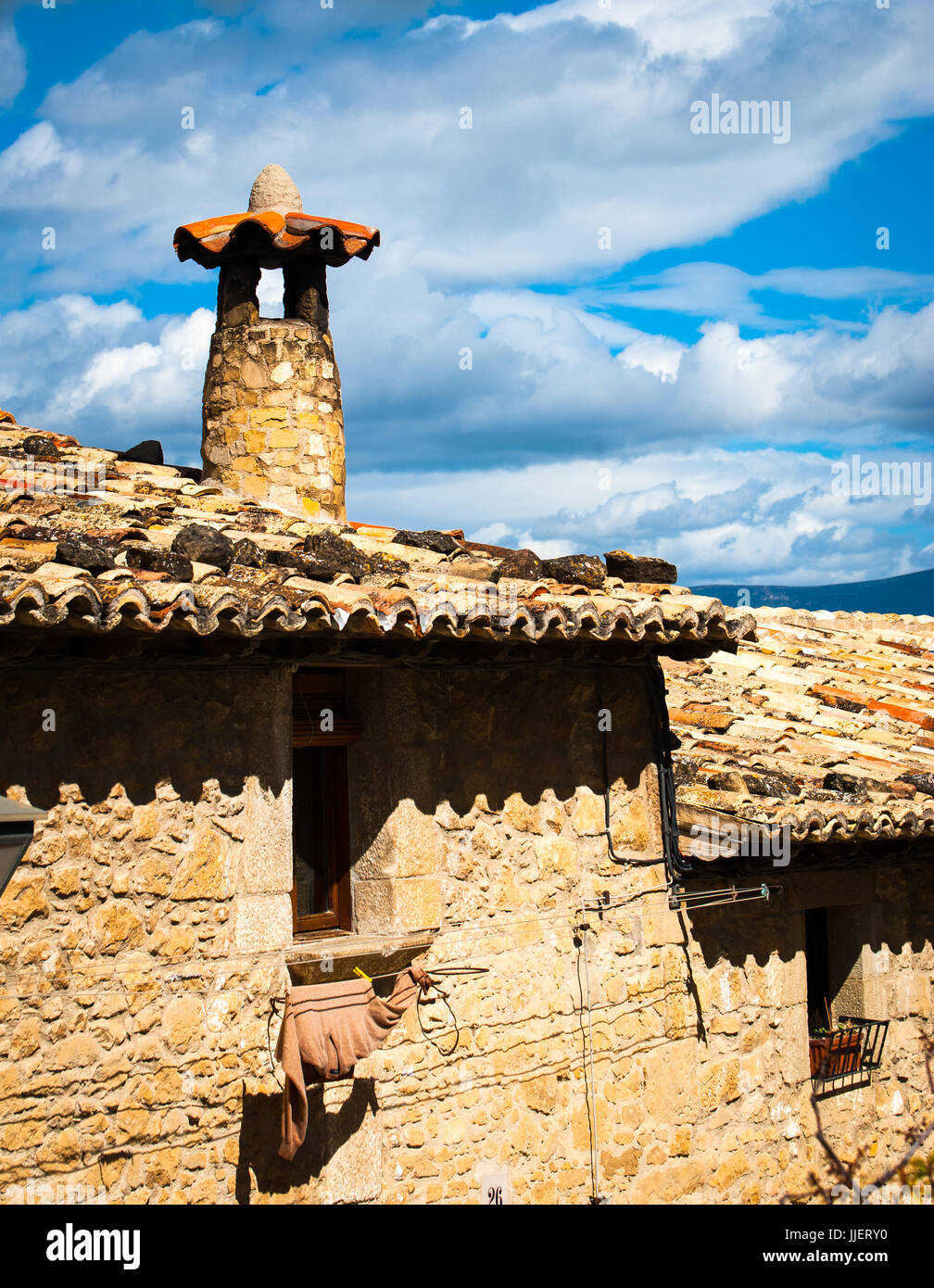 Specific shape of chimneys of a Spanish village Stock Photo - Alamy