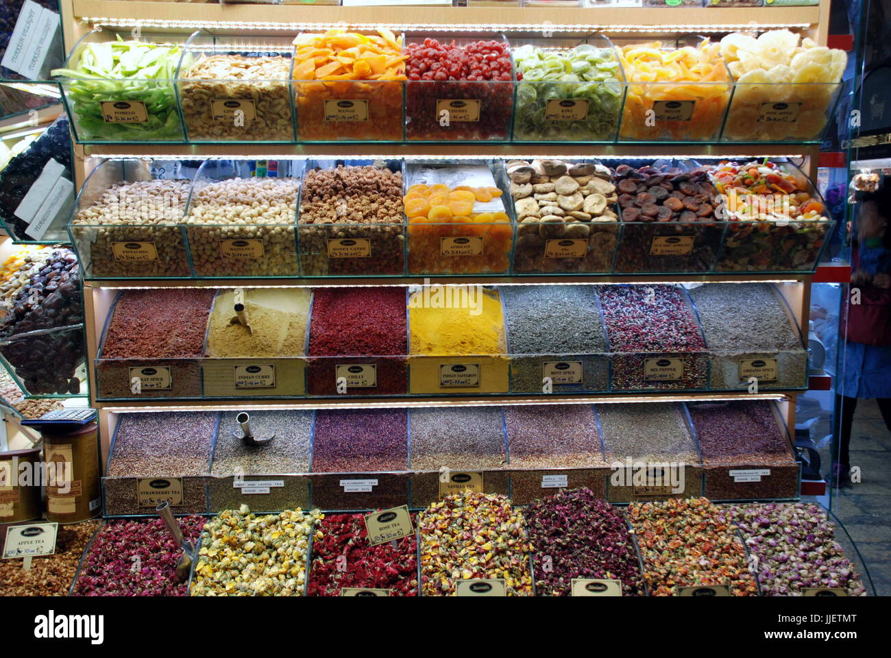 Colourful display of herbs and spices in a store window Stock Photo - Alamy