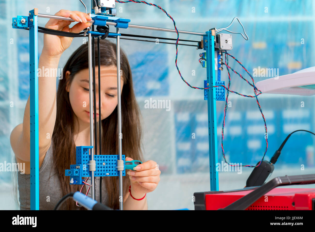 Student girl in robotics lab Stock Photo - Alamy