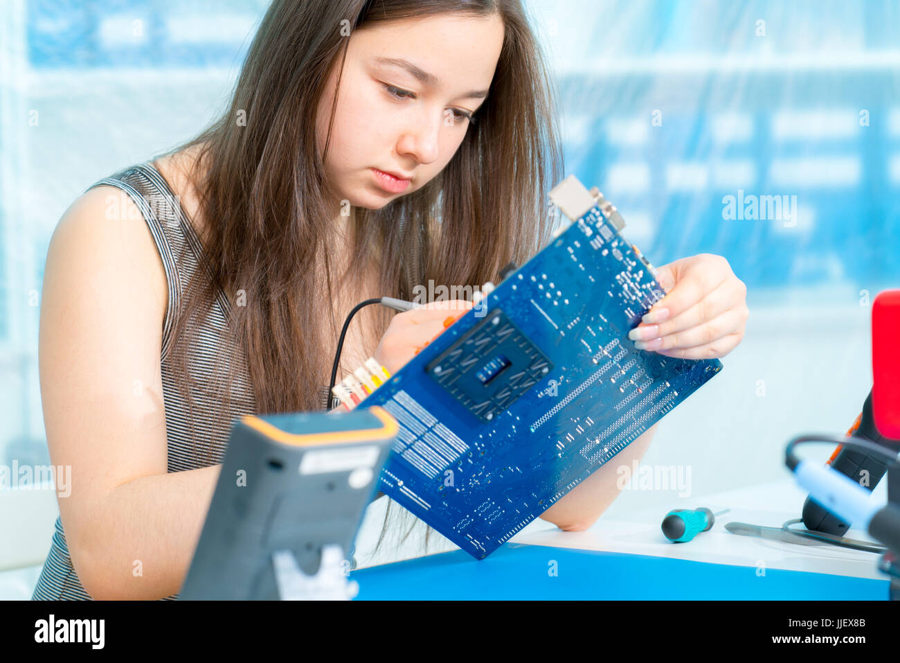 School girl in robotic class with PCB Stock Photo - Alamy