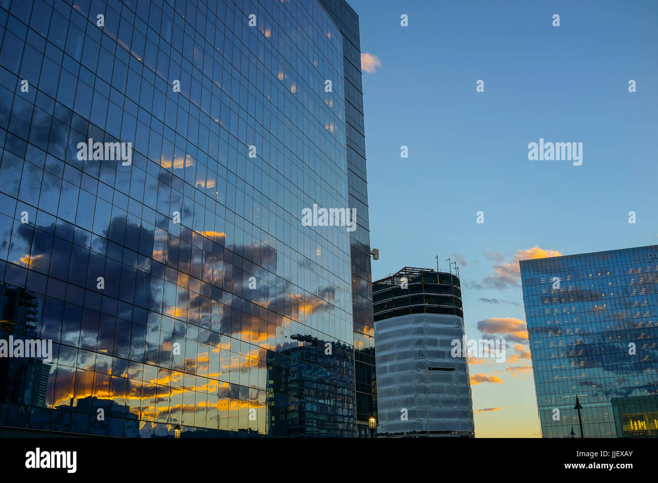 Sunset Reflection on Business Buildings Stock Photo - Alamy