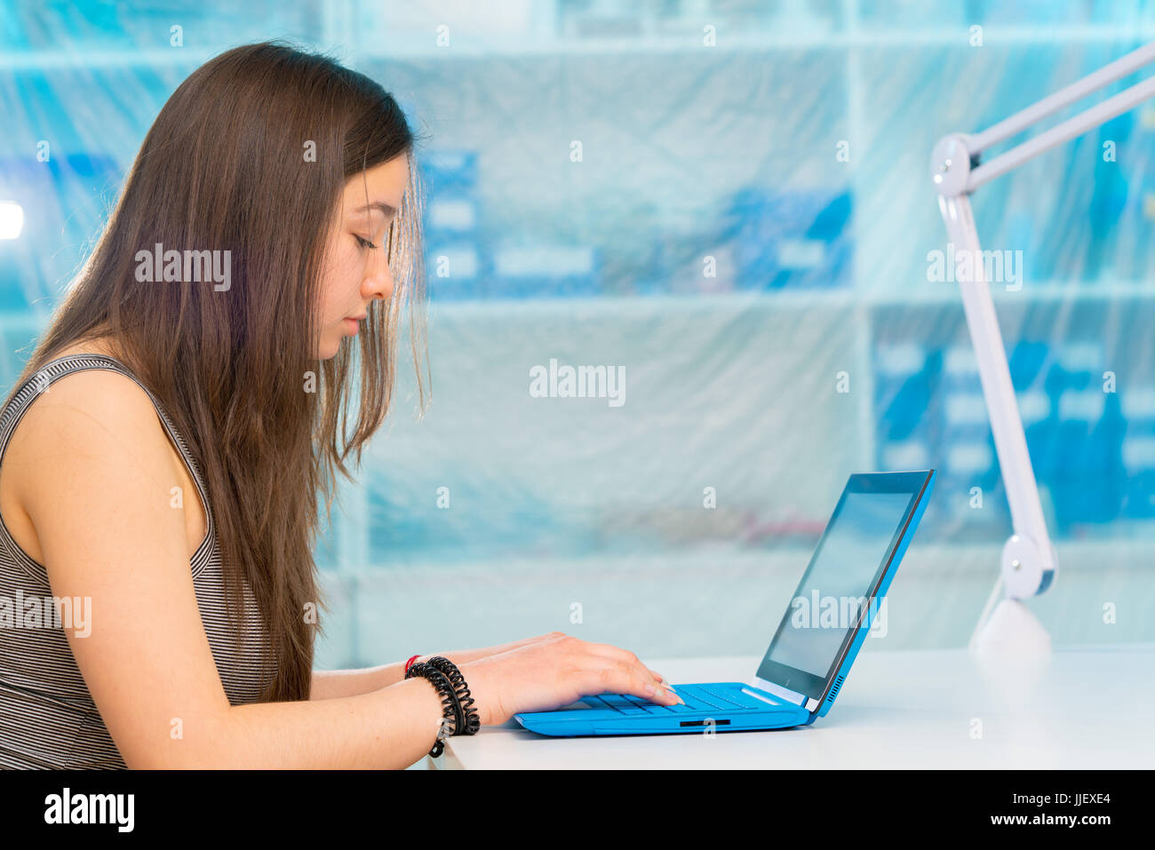 girl is working at the computer Stock Photo - Alamy